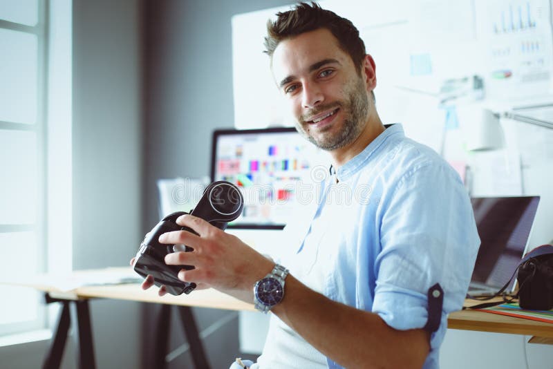 Young Male Software Programmer Testing a New App with 3d Virtual ...