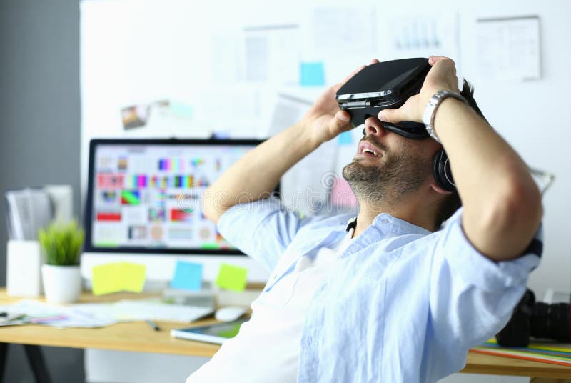 Young Male Software Programmer Testing a New App with 3d Virtual ...