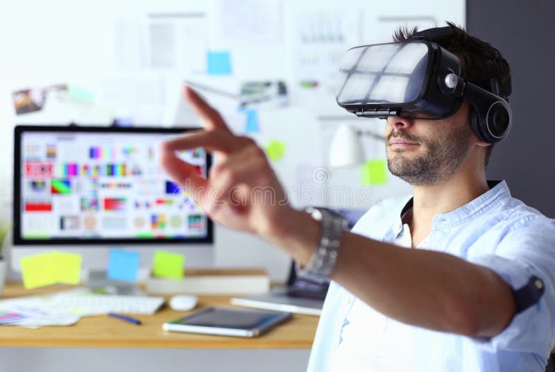 Young Male Software Programmer Testing a New App with 3d Virtual ...