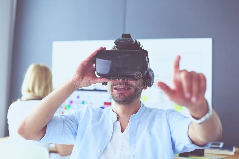 Young Male Software Programmer Testing a New App with 3d Virtual ...