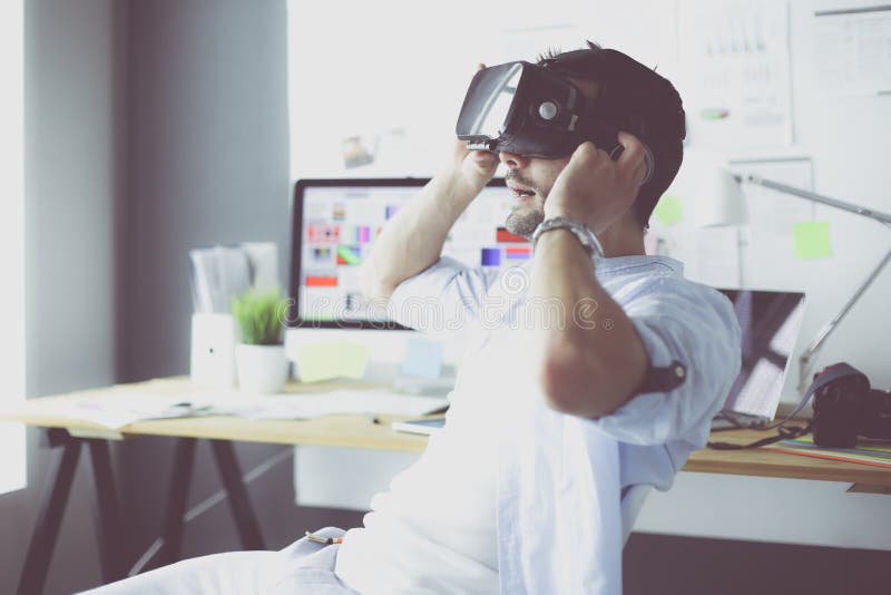 Young Male Software Programmer Testing a New App with 3d Virtual ...