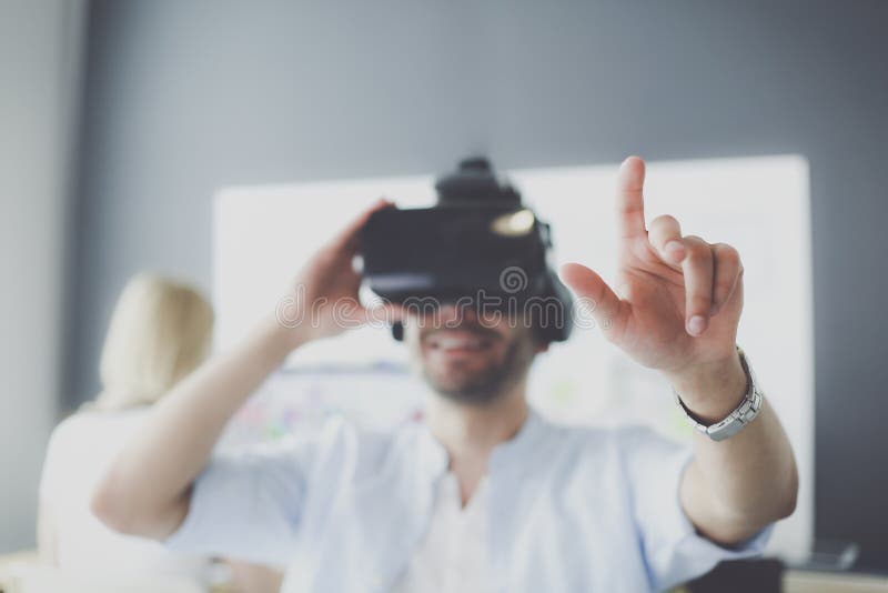 Young Male Software Programmer Testing a New App with 3d Virtual ...