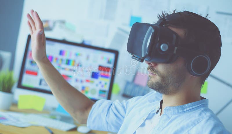 Young Male Software Programmer Testing a New App with 3d Virtual ...