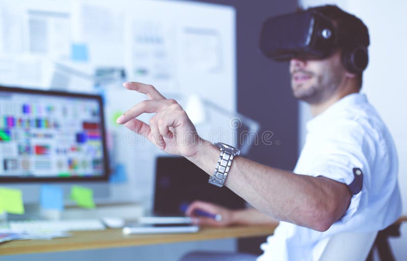Young Male Software Programmer Testing a New App with 3d Virtual ...