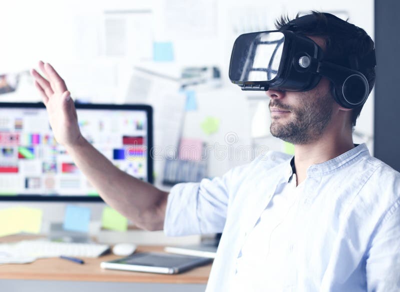 Young Male Software Programmer Testing a New App with 3d Virtual ...