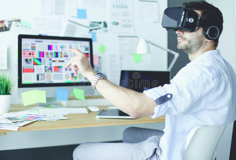 Young Male Software Programmer Testing a New App with 3d Virtual ...