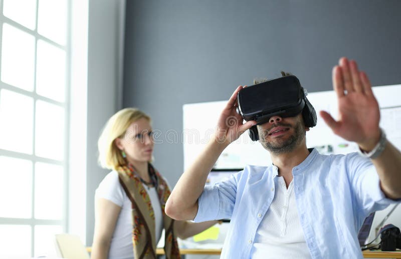 Young Male Software Programmer Testing a New App with 3d Virtual ...