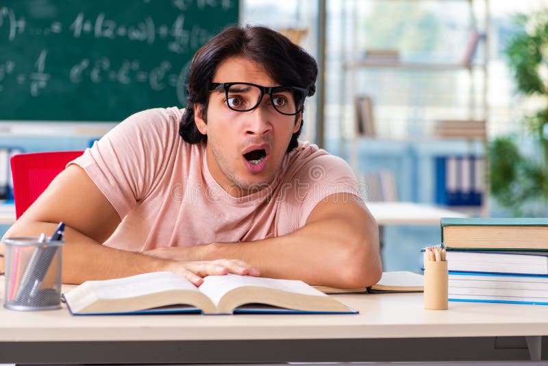 The Young Male Student in the Classroom Stock Image - Image of algebra ...