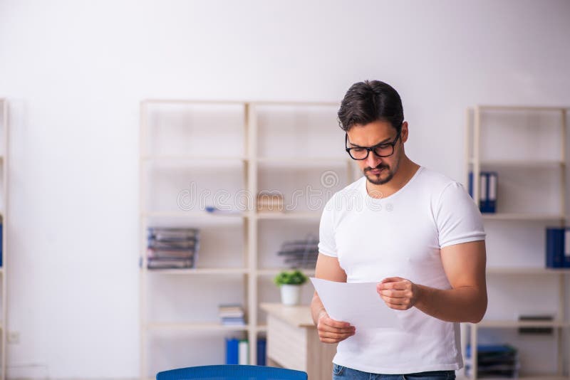 Young Male Student Employee at Workplace Stock Photo - Image of ...