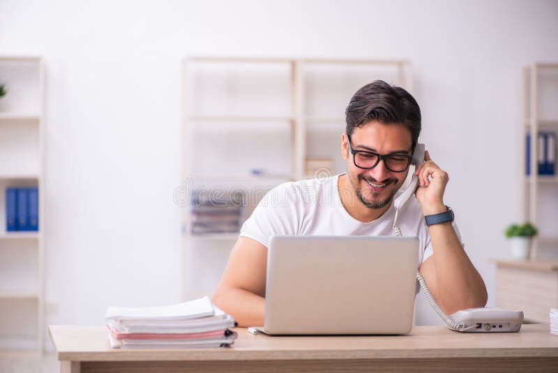 Young Male Student Employee at Workplace Stock Photo - Image of ...