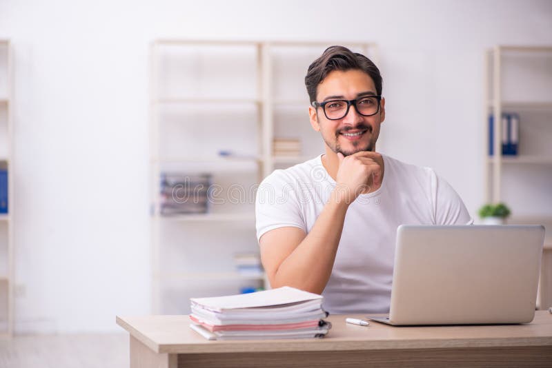 Young Male Student Employee at Workplace Stock Photo - Image of ...