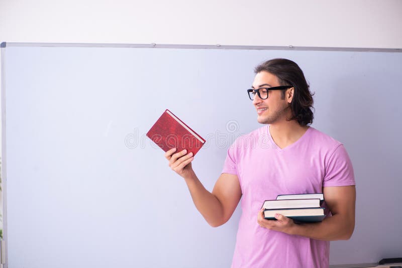 Young Male Student in Front of Board Stock Photo - Image of presenting ...