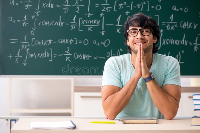 The Young Male Student Mathematician in Front of Chalkboard Stock Photo ...