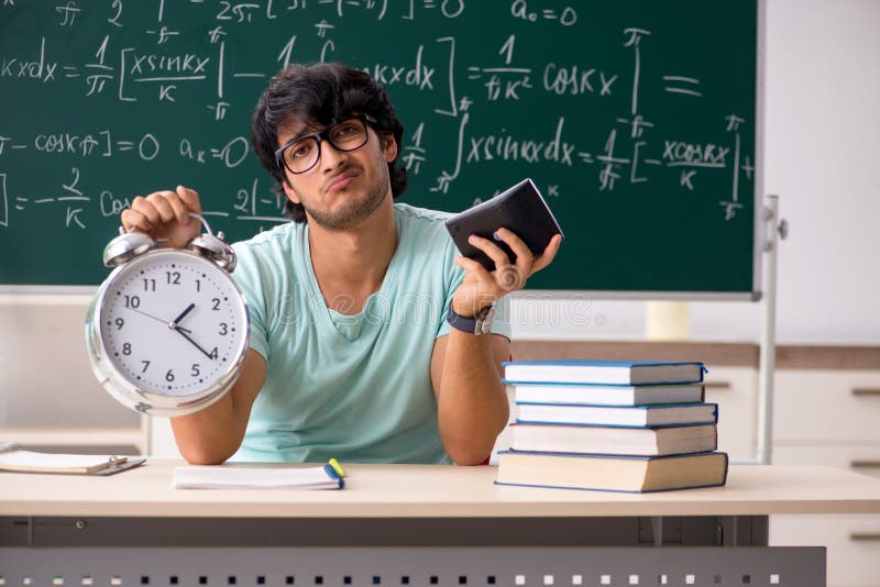 The Young Male Student Mathematician in Front of Chalkboard Stock Photo ...