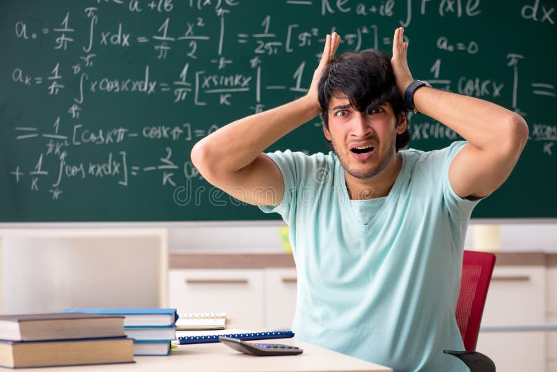 The Young Male Student Mathematician in Front of Chalkboard Stock Image ...
