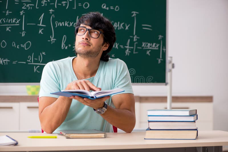 The Young Male Student Mathematician in Front of Chalkboard Stock Photo ...