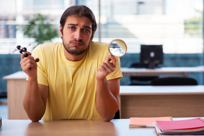 Young Male Student Physicist Preparing for Exams in the Classroom Stock ...