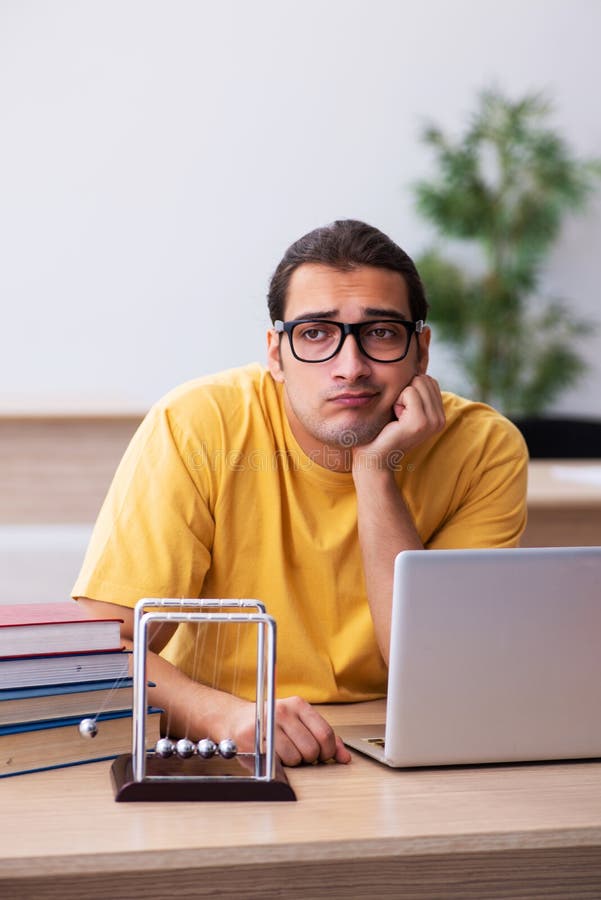 Young Male Student Physics Preparing for Exams in the Classroom Stock ...