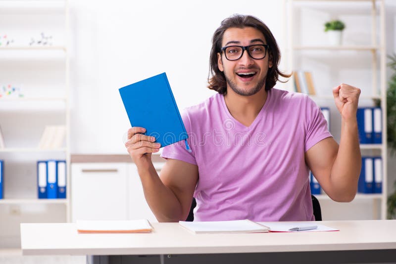 Young Male Student Preparing for Exams at Classroom Stock Image - Image ...