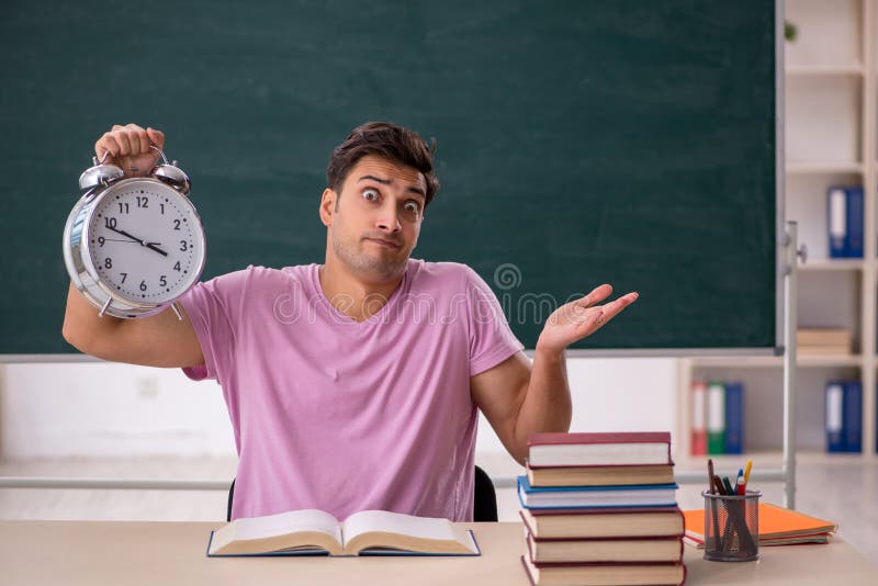 Young Male Student Preparing for Exams in Time Management Concep Stock ...