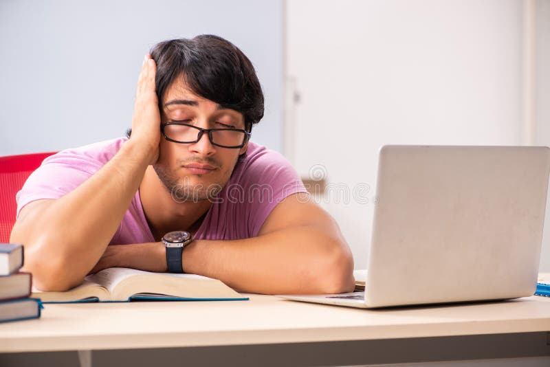 The Young Male Student Sitting in the Class Stock Photo - Image of ...