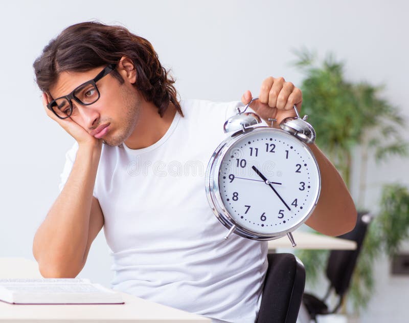 Young Male Student Sitting in the Classroom Stock Image - Image of ...
