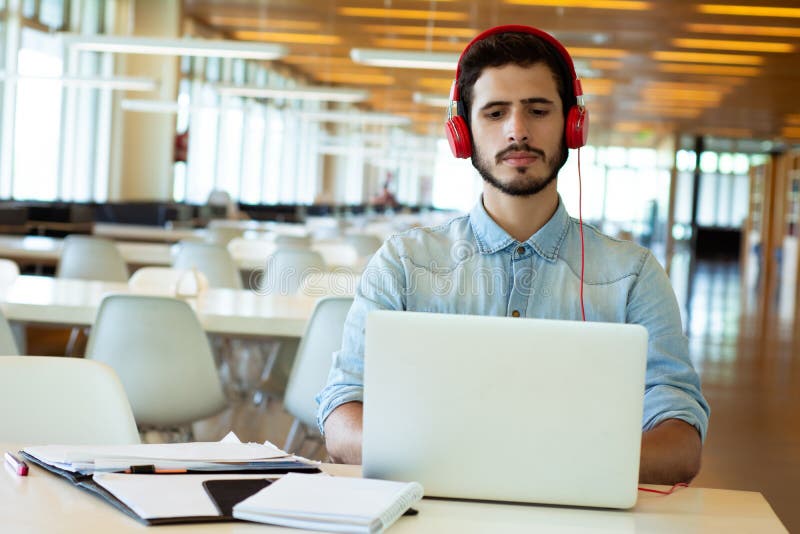 Young Male Student Studying in the Library Stock Image - Image of ...