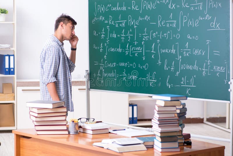 The Young Male Student Studying Math at School Stock Photo - Image of ...
