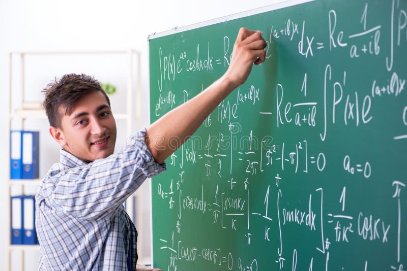 The Young Male Student Studying Math at School Stock Photo - Image of ...