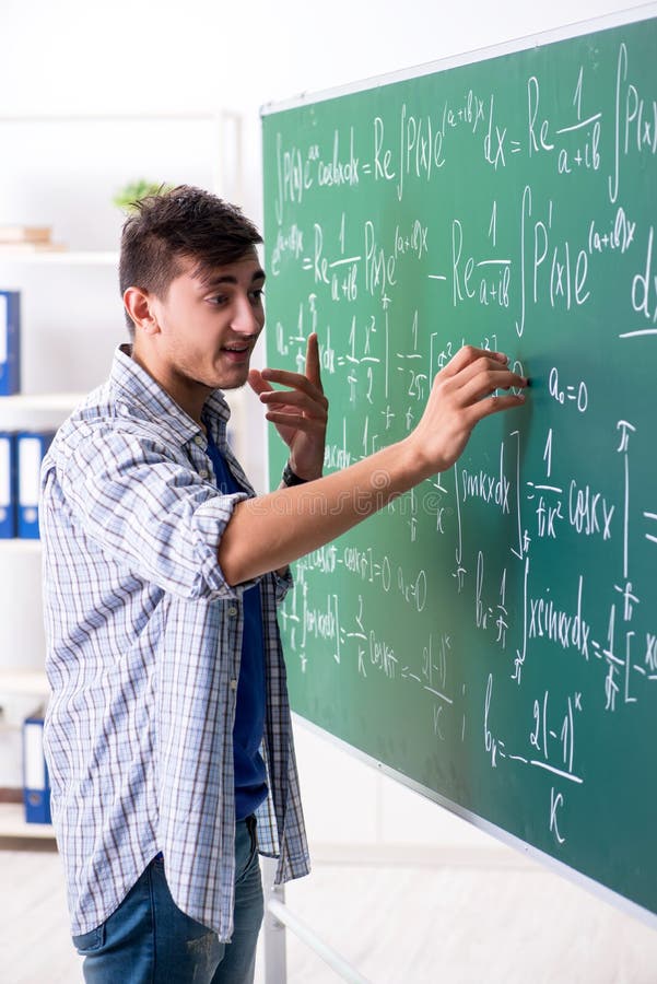 The Young Male Student Studying Math at School Stock Photo - Image of ...