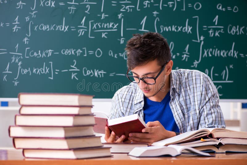 The Young Male Student Studying Math at School Stock Photo - Image of ...