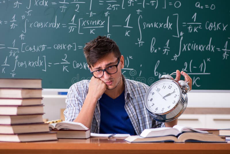 The Young Male Student Studying Math at School Stock Photo - Image of ...