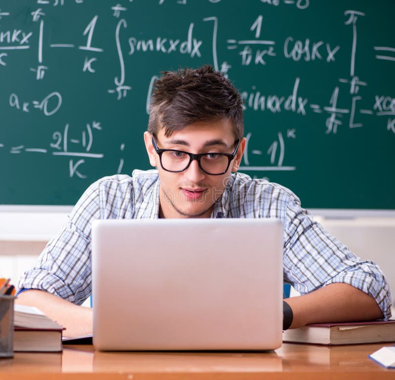 The Young Male Student Studying Math at School Stock Photo - Image of ...
