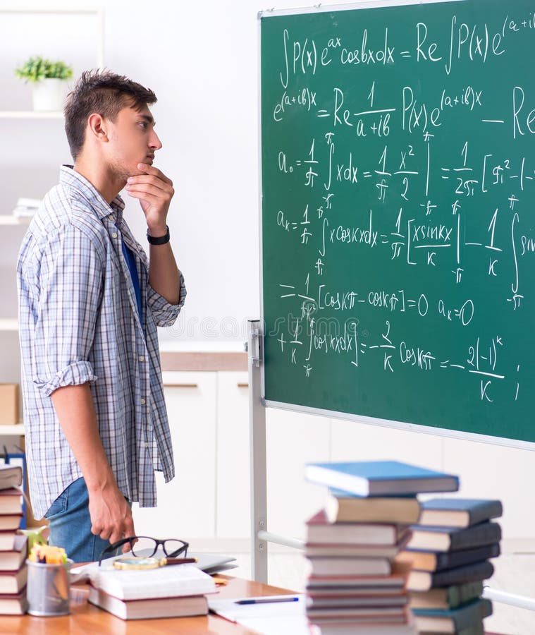 Young Male Student Studying Math at School Stock Photo - Image of ...