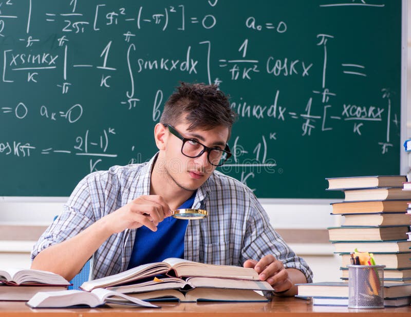Young Male Student Studying Math at School Stock Image - Image of ...