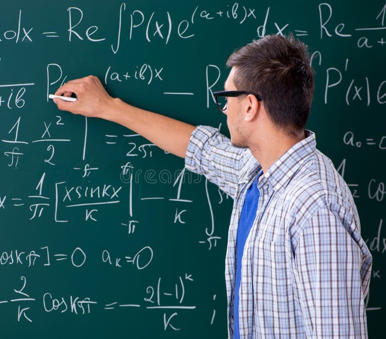 Young Male Student Studying Math at School Stock Photo - Image of board ...