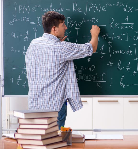 Young Male Student Studying Math at School Stock Photo - Image of math ...