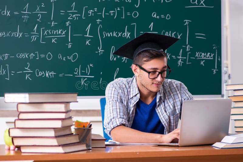 The Young Male Student Studying Math at School Stock Photo - Image of ...