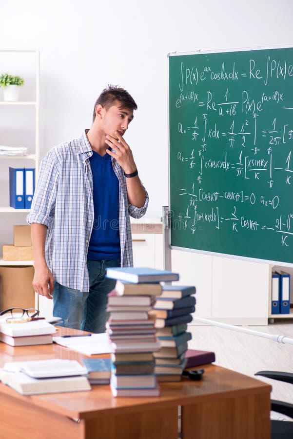 The Young Male Student Studying Math at School Stock Photo - Image of ...