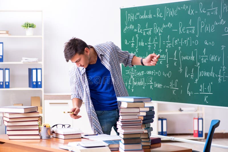 The Young Male Student Studying Math at School Stock Photo - Image of ...