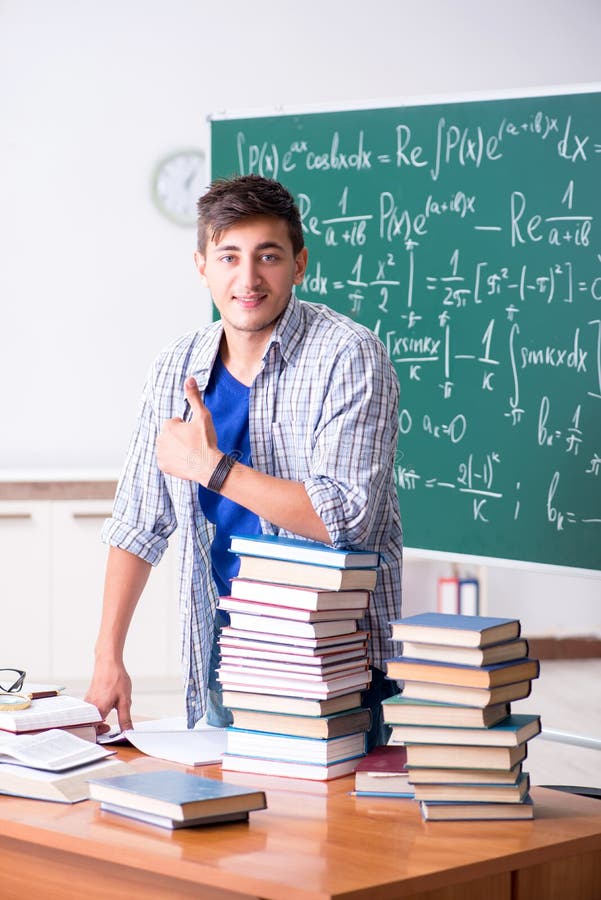 The Young Male Student Studying Math at School Stock Photo - Image of ...