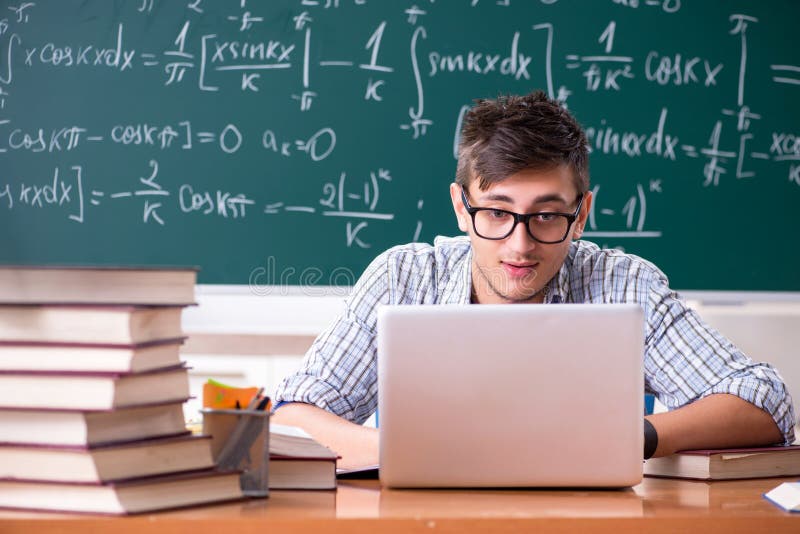 The Young Male Student Studying Math at School Stock Photo - Image of ...