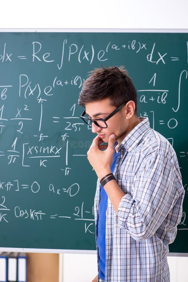 The Young Male Student Studying Math at School Stock Photo - Image of ...