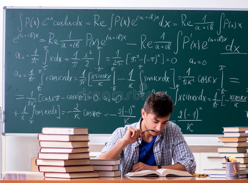 The Young Male Student Studying Math at School Stock Photo - Image of ...