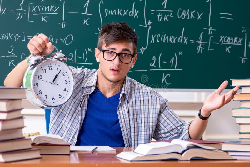 Young Male Student Studying Math at School Stock Photo - Image of alarm ...