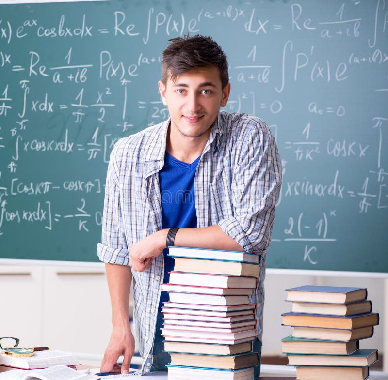 Young Male Student Studying Math at School Stock Image - Image of ...
