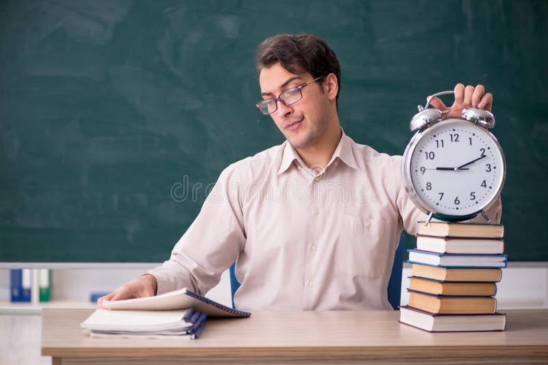 Young Male Student in Time Management Concept Stock Photo - Image of ...