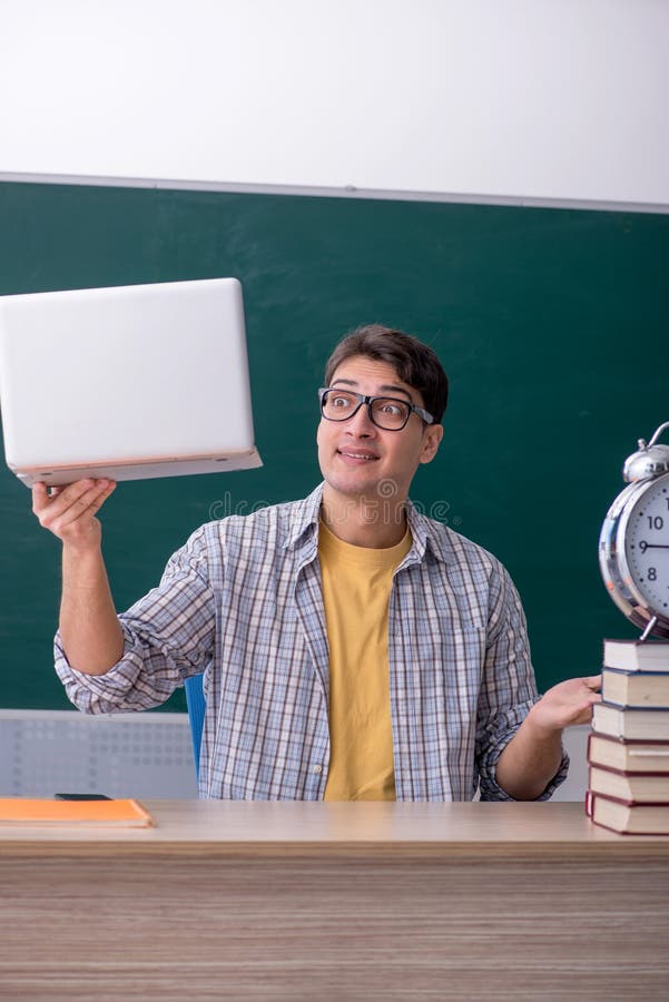 Young Male Student in Time Management Concept Stock Photo - Image of ...