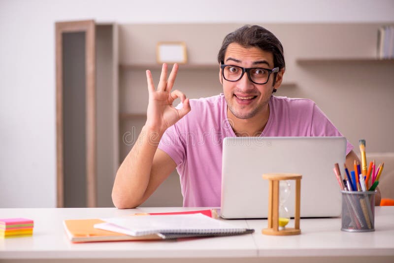 Young Male Student in Time Management Concept Stock Photo - Image of ...