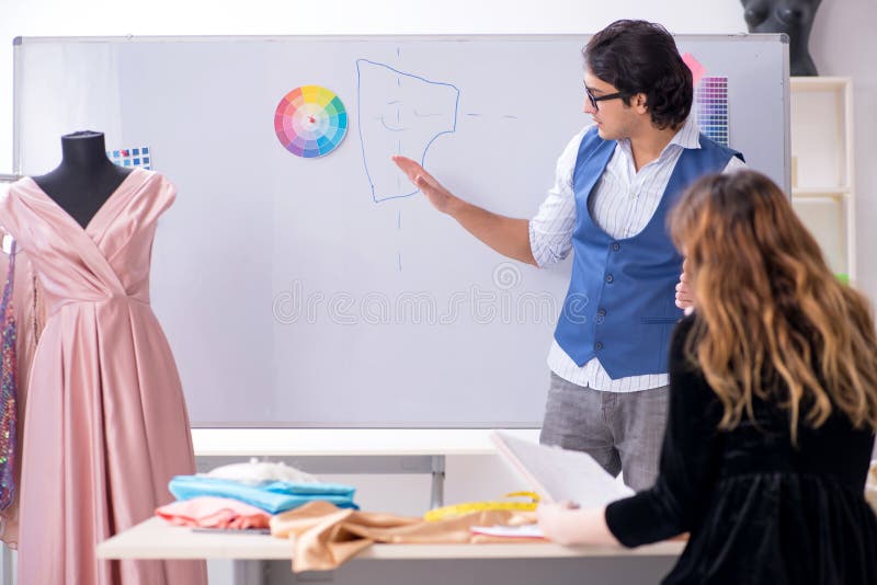 Tailor is teaching student stock image. Image of repair - 165278399